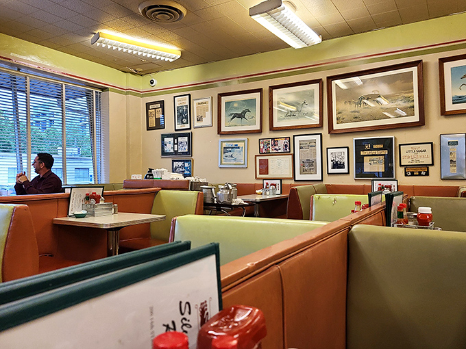 Time travel isn't science fiction&mdash;it's sliding into these mint-green booths where decades of conversations have seasoned the walls like a well-used cast iron pan.