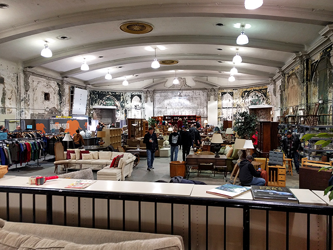 Welcome to the cathedral of second chances. Soaring ceilings and weathered walls create the perfect backdrop for furniture finds that span decades of design history.