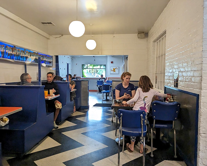 Blue booths and checkered floors transport you to a time when diners were the original social networks. Conversation flows as freely as the coffee.