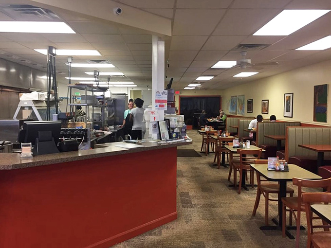 Inside Ray's, time slows down just enough to savor both your meal and the community gathering around you. The red counter beckons like an old friend.