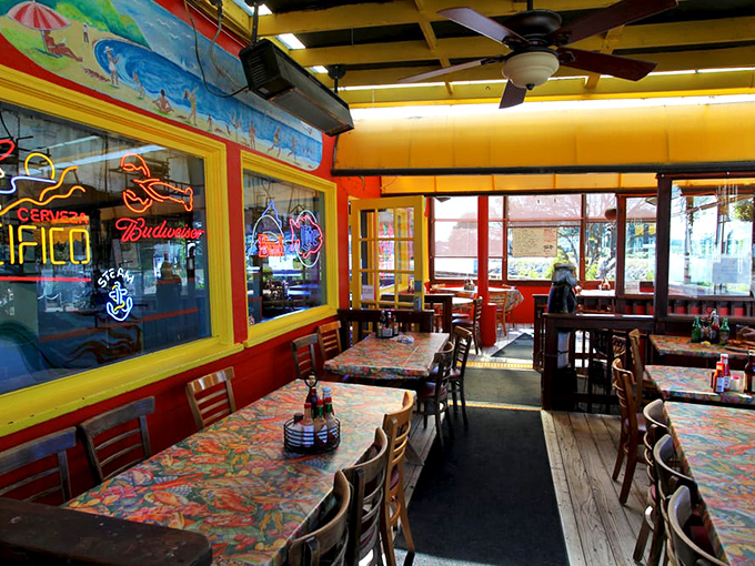 Inside, colorful tablecloths and neon beer signs create that perfect "I've discovered something authentic" atmosphere that no designer could replicate.