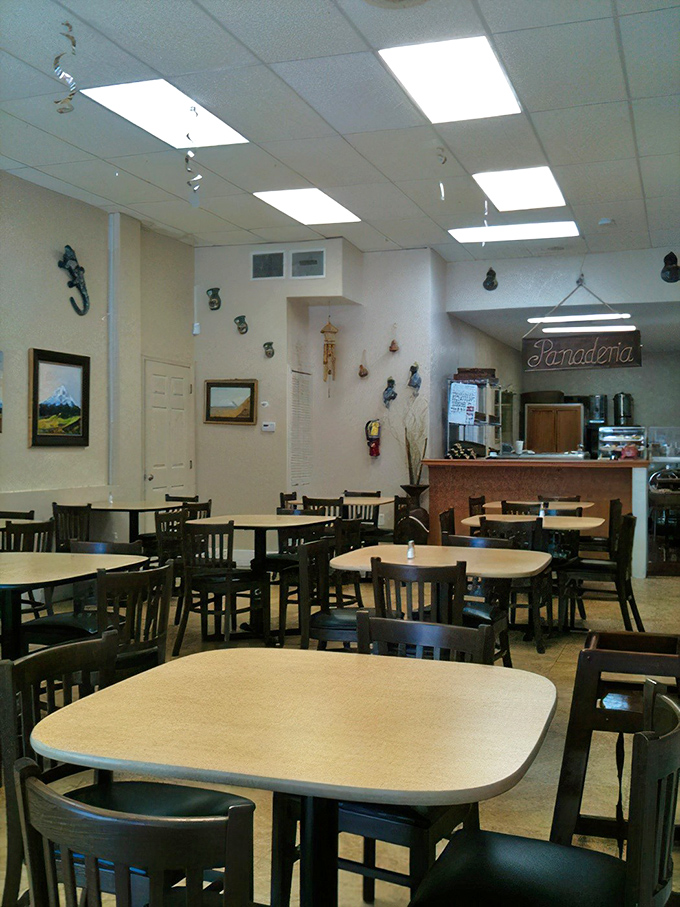 Simple tables, modest decor, and that "Panaderia" sign promising fresh-baked treasures&mdash;this is where memories are made, one meal at a time.