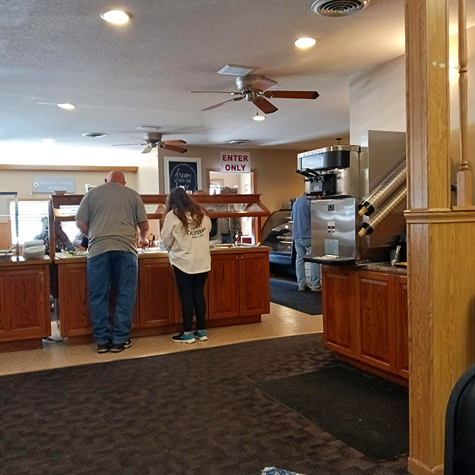 Inside Jo's, where ceiling fans whirl above the breakfast buffet line&mdash;democracy in dining where everyone serves themselves equal portions of morning happiness.