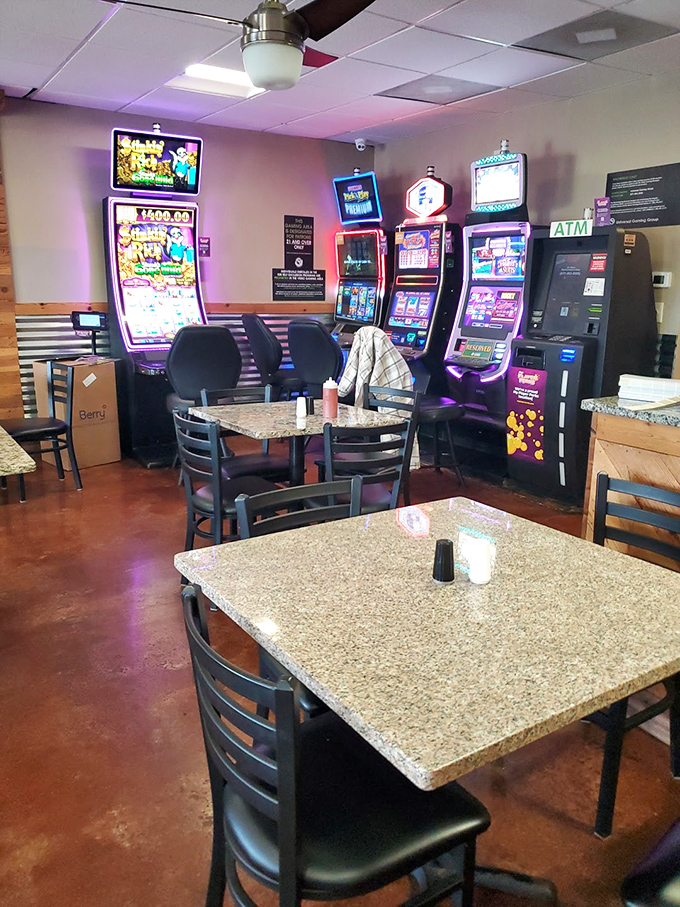 Gaming machines and simple tables create that perfect "neighborhood joint" vibe. Come for the beef, stay for one more sandwich.