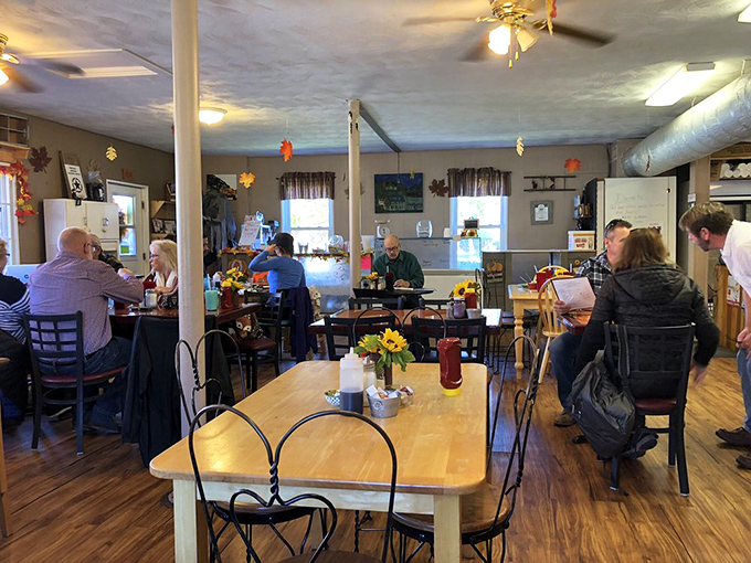 Where locals and travelers break bread together. Notice the fresh flowers on the tables&mdash;little touches that chain restaurants forgot matter.