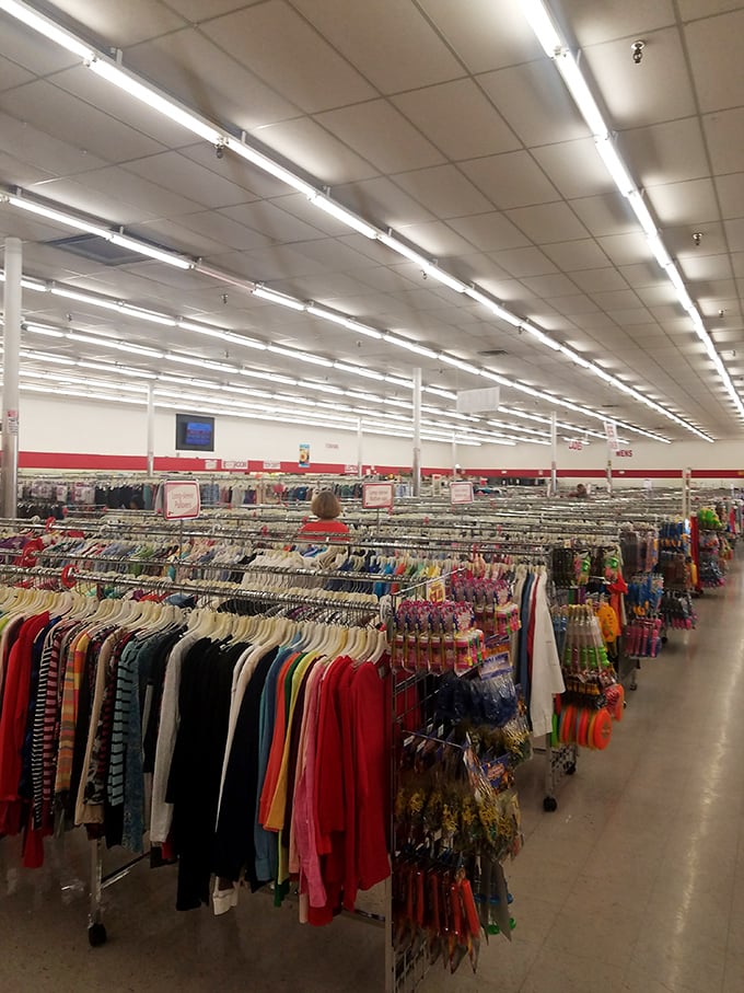 Not your grandmother's yard sale. Miles of clothing racks stretch into fluorescent infinity, promising vintage treasures at every turn.