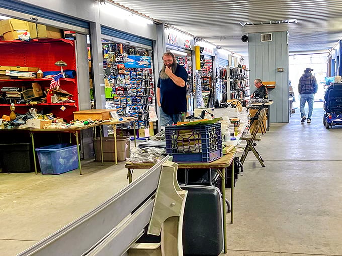 The indoor market: where serious collectors and casual browsers alike navigate aisles packed with decades of American material culture.