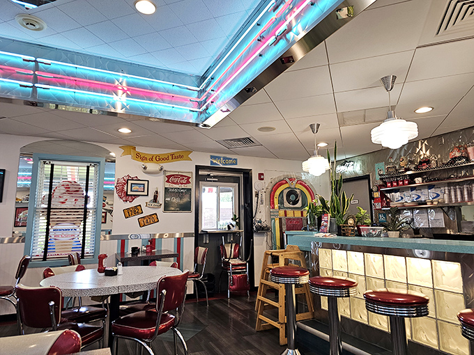 Step inside and the neon glow transports you instantly. Those ceiling lights aren't just illuminating the room—they're broadcasting "happiness served here" in technicolor.