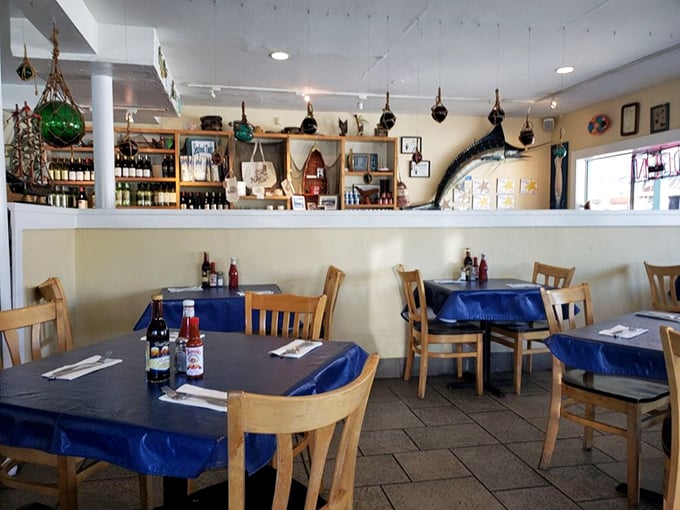 Blue tablecloths and nautical decor set the stage for seafood stardom. No Instagram filters needed when the authenticity is this real.