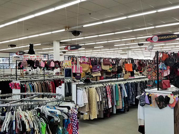 Classic black and red vinyl booths invite you to slide in and stay awhile &ndash; each one a front-row seat to the timeless theater of diner life.