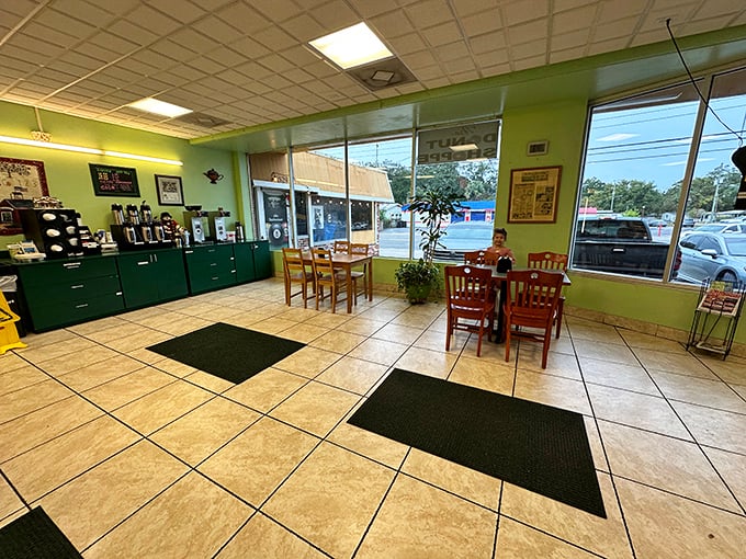 Mint green walls and simple furnishings create the perfect backdrop for donut contemplation. This isn't Instagram bait—it's a temple of taste.