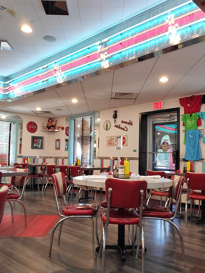 Step inside and the decades melt away&mdash;neon lights, chrome accents, and those iconic red vinyl chairs transport you to an era when Elvis was king and milkshakes ruled.