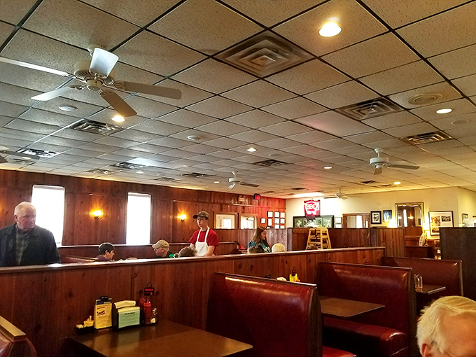 Wood-paneled walls and vinyl booths tell you this place prioritizes substance over style. The food does the talking here.