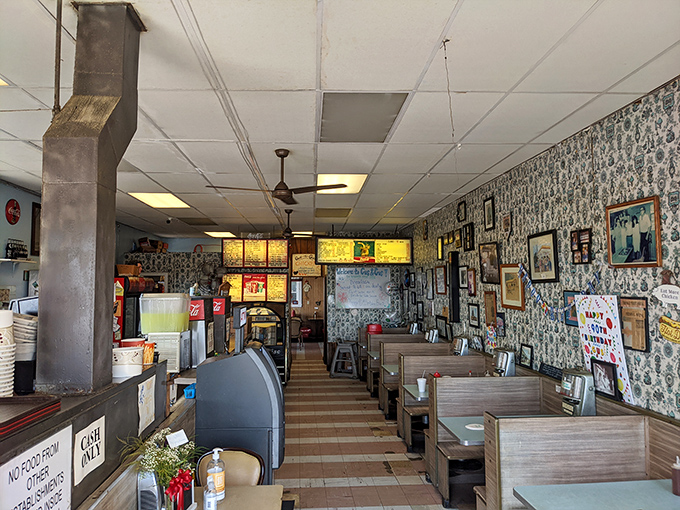 Step inside to find walls adorned with decades of memories, wooden booths that have hosted generations of beachgoers, and the promise of simple perfection.