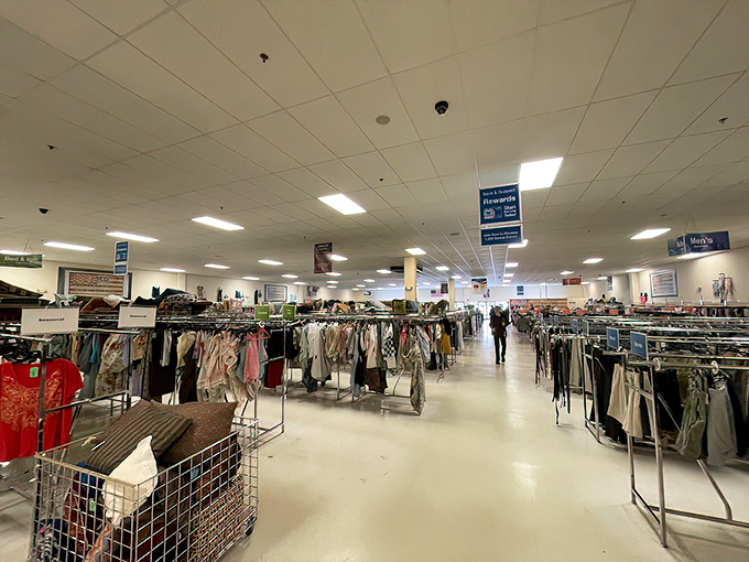 Endless racks stretch toward retail infinity. The clothing section offers a textile sea where yesterday's fashion finds new admirers.