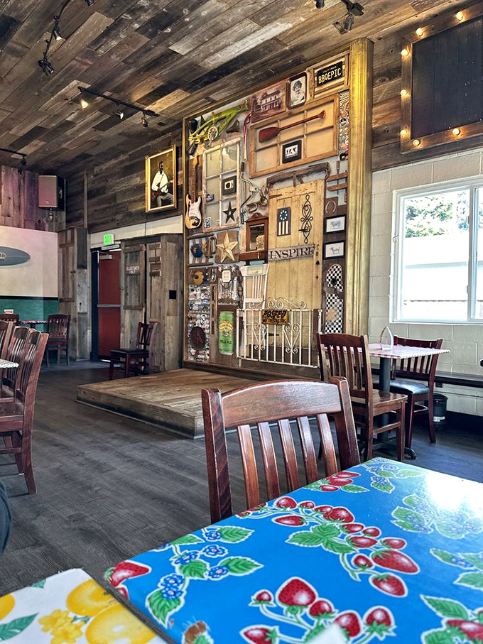 Rustic wooden ceilings and eclectic wall art create the perfect backdrop for serious barbecue contemplation. No white tablecloths needed when the food's this good.