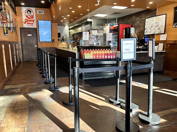 The orderly queue setup isn't just practical&mdash;it's the culinary equivalent of a velvet rope, separating you from peach cobbler nirvana for just a few more minutes.