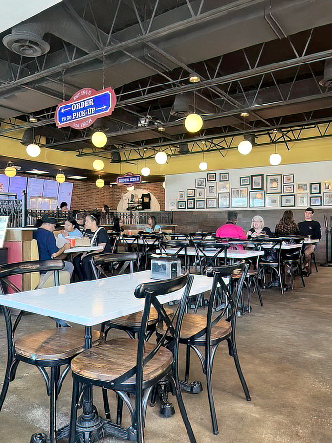 Inside La Segunda, time slows down as patrons gather at bistro tables beneath globe lights, participating in Tampa's longest-running love affair with Cuban pastries.