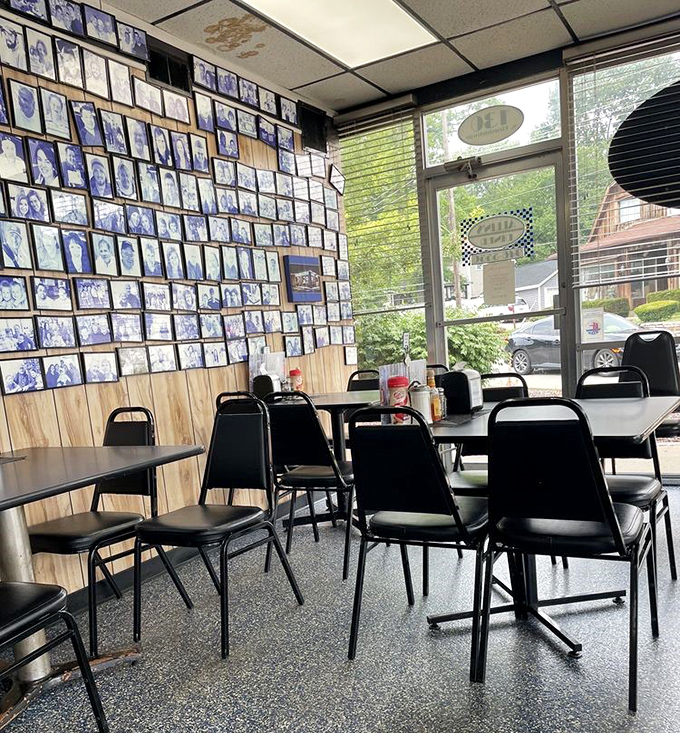 A wall of memories tells the real story: this isn't just a diner, it's a community photo album with tables.