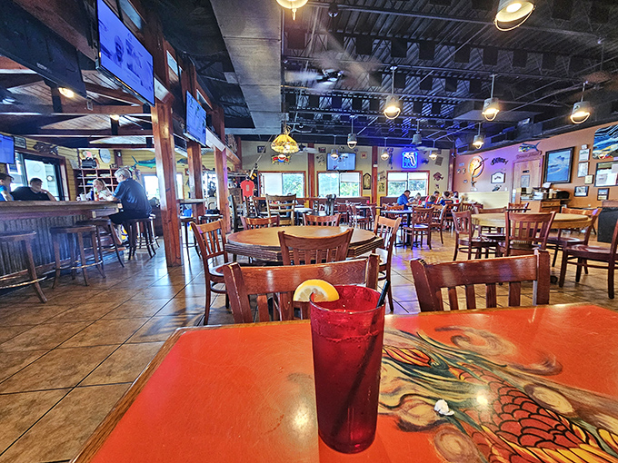 Inside, wooden tables and nautical décor create that perfect "I've discovered something special" atmosphere where cold drinks and fish stories flow freely.