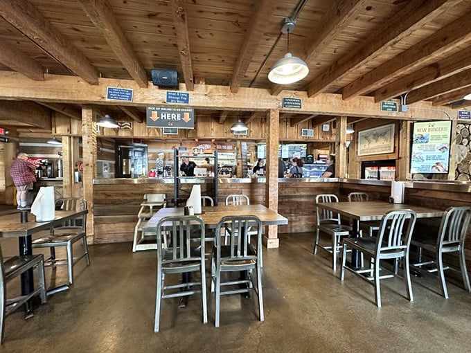 Exposed wooden beams, natural light, and metal chairs create that perfect "discovered gem" atmosphere where memories are made between bites.