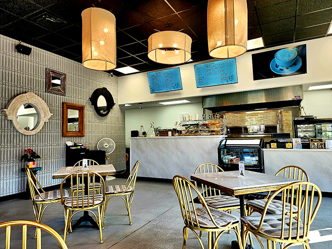 The caf&eacute;'s interior strikes that perfect balance between "Instagram-worthy" and "actually comfortable enough to stay awhile." Those pendant lights aren't just illuminating tables&mdash;they're spotlighting culinary magic.