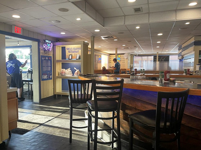 Inside, the warm wood tones and nautical touches create that perfect "come as you are" atmosphere where flip-flops meet celebration dinners.