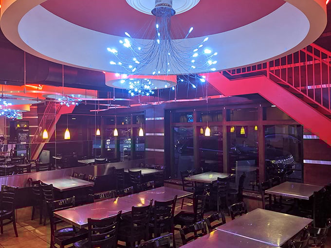 Modern chandeliers cast a dreamy glow over the dining area, creating the perfect lighting for both romantic whispers and Instagram-worthy dessert shots.