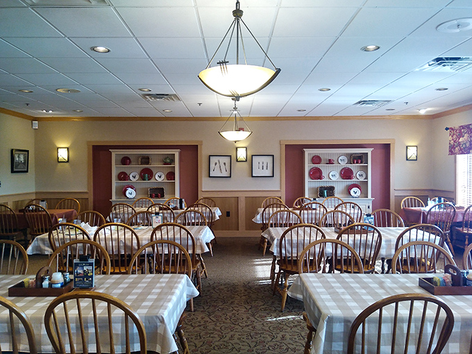 Spindle-back chairs and checkered tablecloths create that "Grandma's dining room" feeling, if Grandma could cook for 200 people without breaking a sweat.
