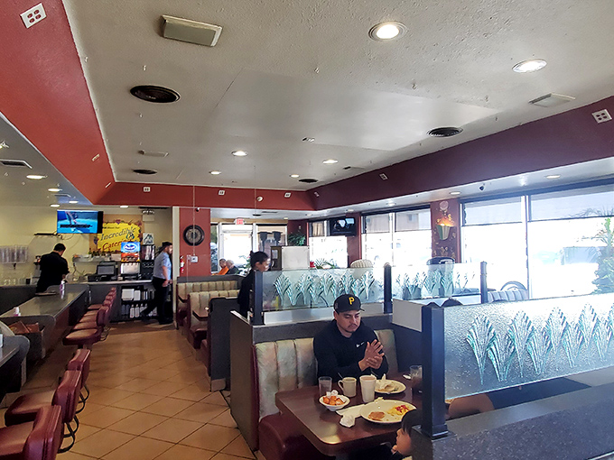 Classic diner charm with red and purple accents creates the perfect backdrop for morning feasts and coffee refills.