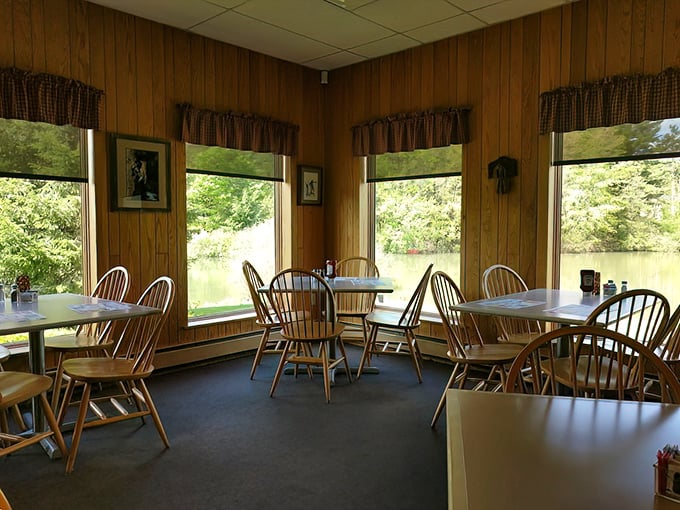 Wood-paneled walls and Windsor chairs create a dining room where time slows down and conversations flow as freely as the coffee.