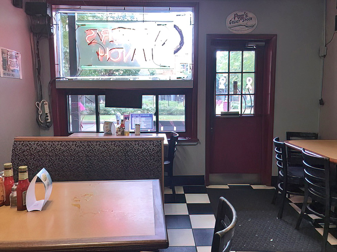 Step inside and the classic black-and-white checkered floor announces you've entered the breakfast equivalent of Narnia &ndash; minus the snow, plus pancakes.