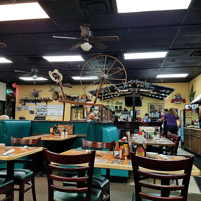Step inside and you've entered breakfast paradise. The wagon wheel chandelier and cowboy d&eacute;cor set the stage for a Western-themed feast that would make John Wayne weep with joy.
