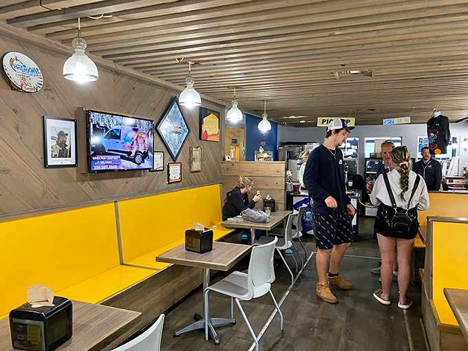 The bright yellow bench seating says "stay awhile" &ndash; and trust me, with food this good, you'll want to.