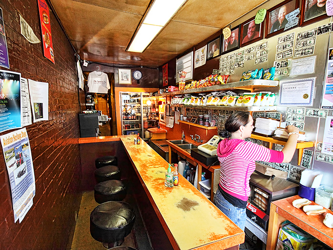 Narrow doesn't begin to describe it! This sliver of a restaurant makes Manhattan studio apartments look spacious, yet somehow fits decades of character into every inch.