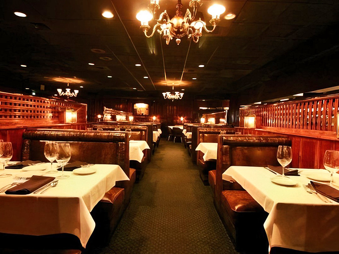 Step inside and time travel begins. These leather booths have cradled more anniversary dinners and business deals than a Vegas wedding chapel.