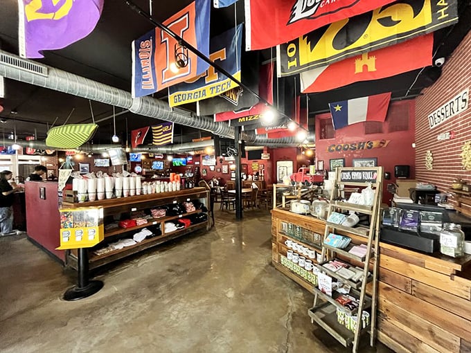 College pennants create a colorful canopy above the industrial-chic interior, where rival football fans set aside differences in pursuit of culinary harmony.