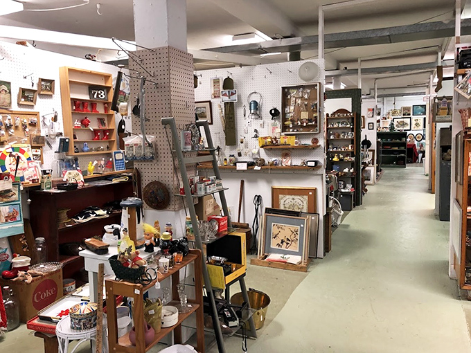 Narrow pathways lead through vendor booths packed with memories. Every aisle is a different decade, every turn a new rabbit hole of nostalgia.