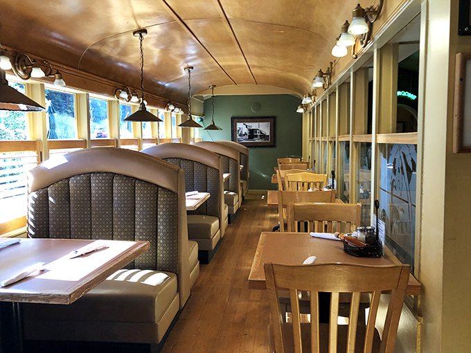 Step inside the historic trolley car dining room where every booth tells a story and the curved ceiling hugs conversations like a warm blanket.