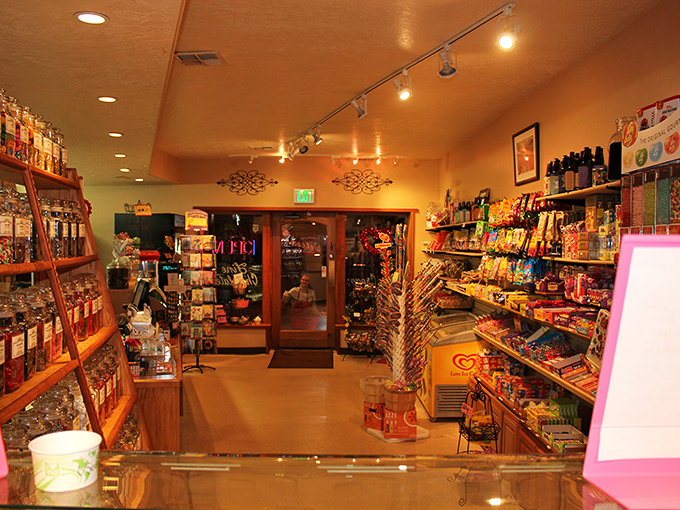 Candy wonderland alert! Wooden shelves lined with colorful treasures create the ultimate sugar safari for explorers of all ages.