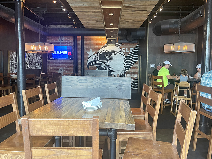 Industrial-chic meets Southern comfort in this thoughtfully designed space. The eagle mural watches over diners like a cheesy guardian angel.