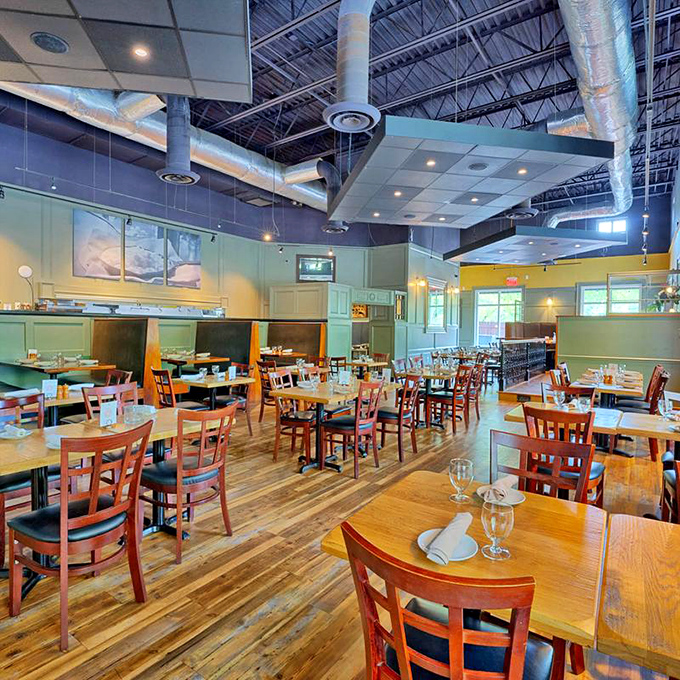 Inside, warm wooden tables and exposed ductwork create that perfect "fancy but not fussy" vibe where both jeans and little black dresses feel at home.