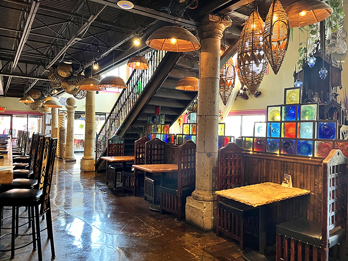 Step inside and you're transported to Mexico through a kaleidoscope of colored glass, hanging lanterns, and stone columns that whisper stories of fiestas past.