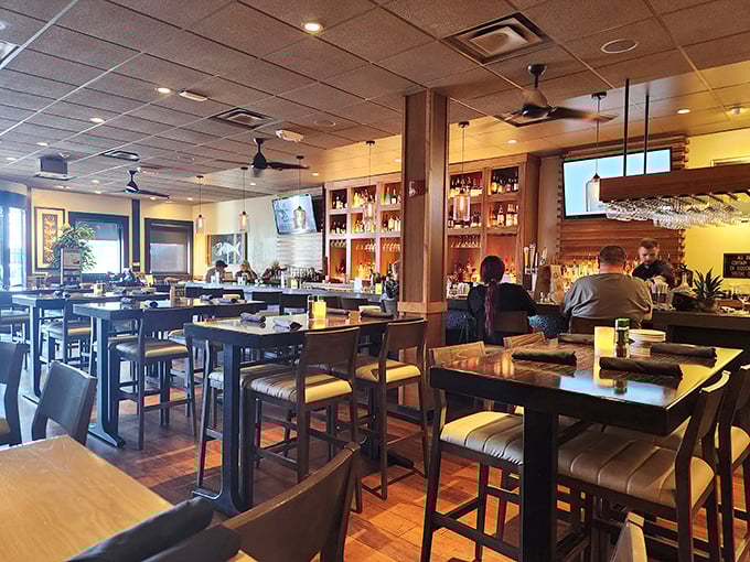 Inside, warm wood tones and ambient lighting create that perfect "special yet comfortable" atmosphere where both date nights and business dinners thrive equally.