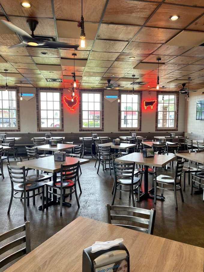 Inside, the no-frills dining room with its wooden ceiling and pendant lights creates the perfect stage for the real star—what's coming from those smokers.