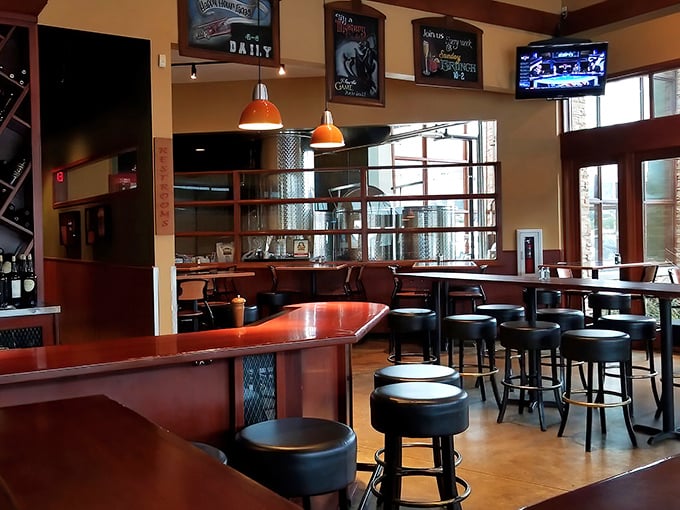 The bar area beckons with its warm wood tones and industrial touches&mdash;a place where strangers become friends and cocktail glasses are never empty for long.