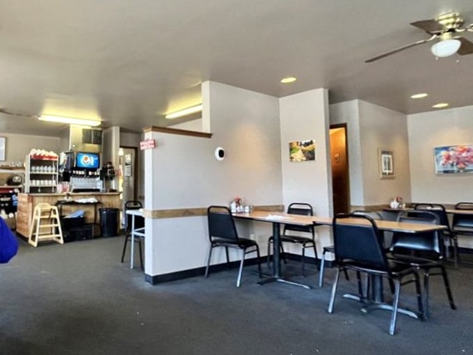 Inside, simplicity reigns supreme&mdash;no fancy frills here, just clean tables and comfortable chairs awaiting your breakfast adventure.