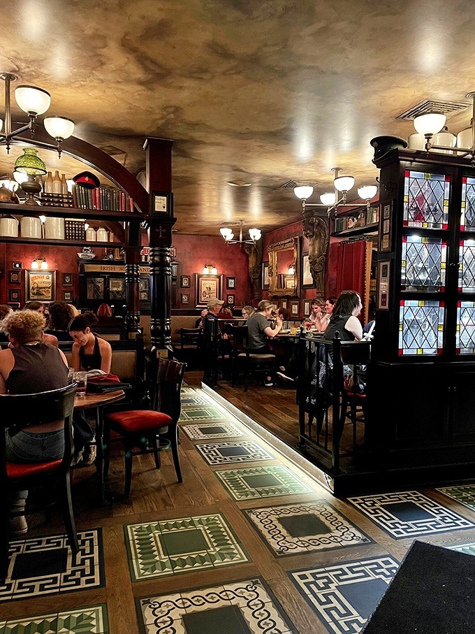 Step into another world where rich mahogany, stained glass, and Celtic-patterned floors transport you straight to Dublin without the jetlag.