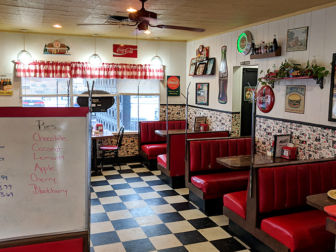 Step inside and the checkerboard floor, red vinyl booths, and Coca-Cola memorabilia hit you with a wave of nostalgia more satisfying than your grandma's apple pie.