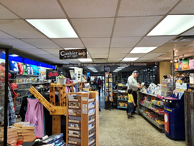 Step inside and enter a time capsule where racing memorabilia meets convenience store charm. The gift shop area is where Derby dreams and souvenirs collide.